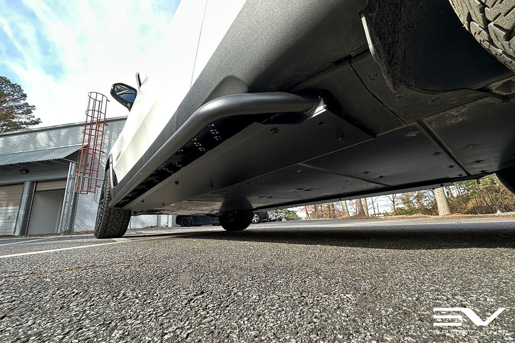 Glacier White Rivian R1T with Triple Square Rock Sliders - EV Sportline ...